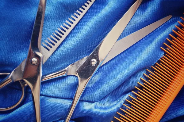 Hair cutting shears and comb Stock Photo by ©luknaja 80255344