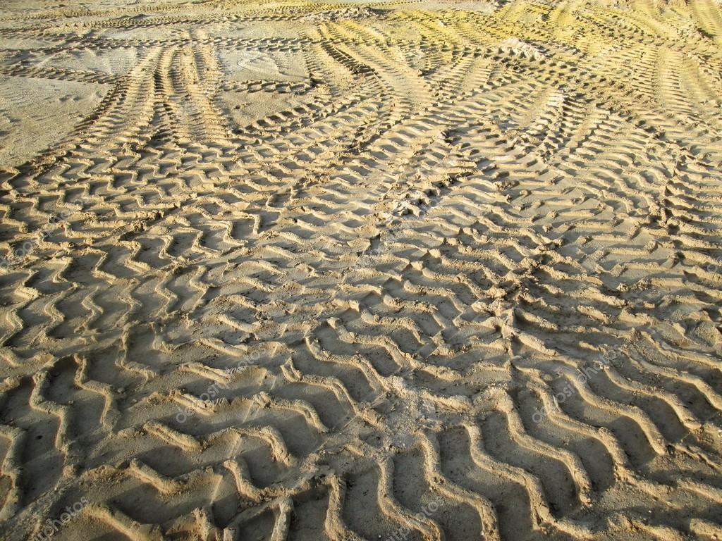 Wheel tracks on the soil. — Stock Photo © luknaja #82662320
