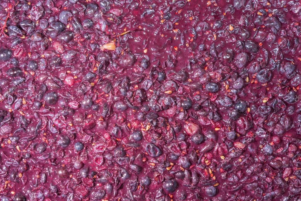 Process of a fermentation of wine, top view of red grapes Stock Photo ...