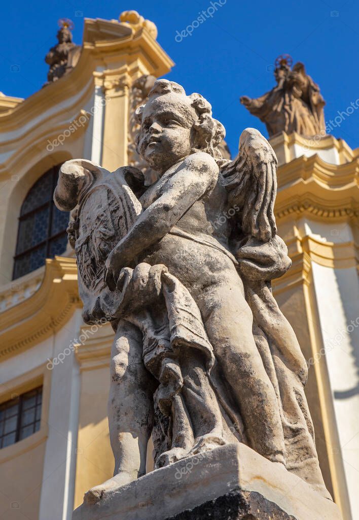 Praga - El ángel barroco y la fachada de la iglesia de Loreto ...