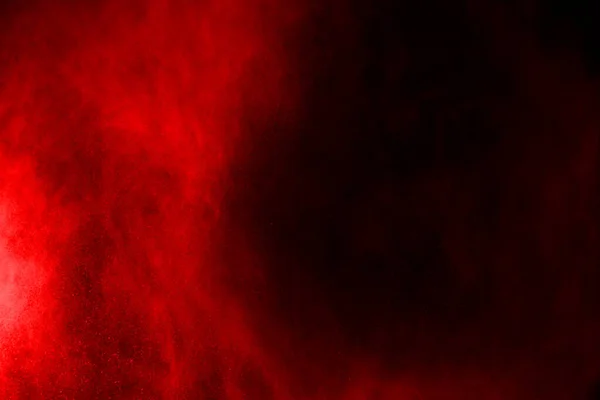 abstract red powder explosion on black background.abstract red powder ...