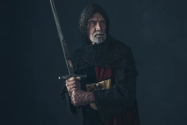 Knight with beard in hauberk Stock Photo by ©ysbrand 114700968