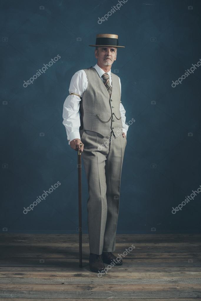 Retro 1920s dandy in suit Stock Photo by ©ysbrand 121485176