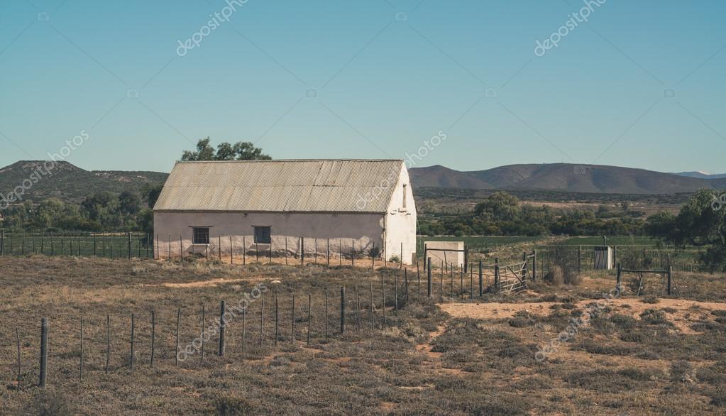 African house with corrugated iron roof in Swartberg semi desert ...