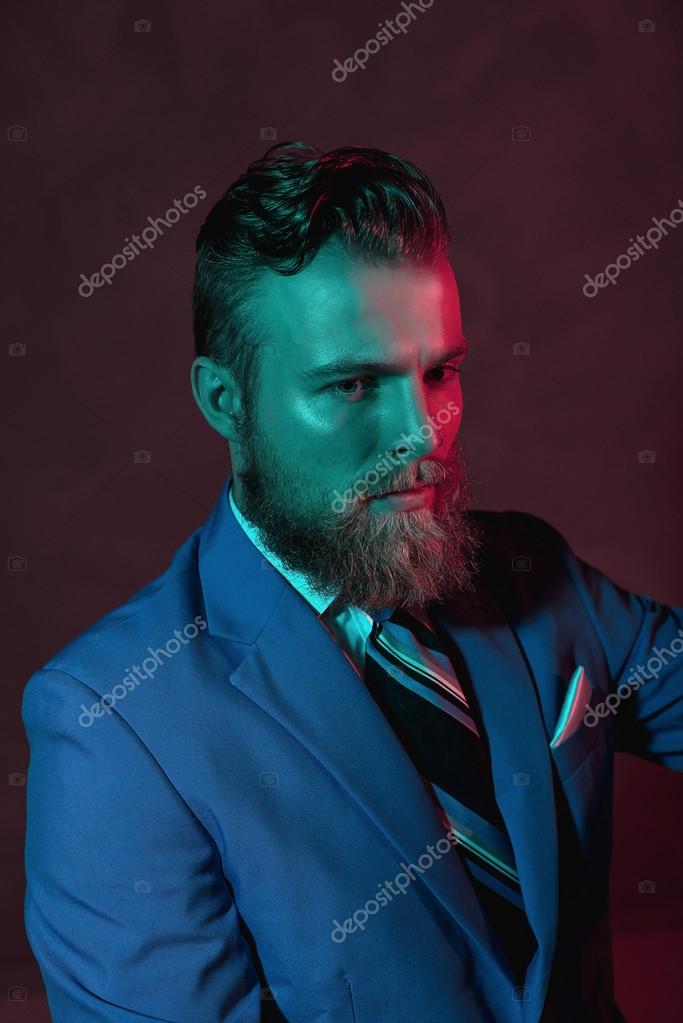 Stern bearded handsome man Stock Photo by ©ysbrand 78593096