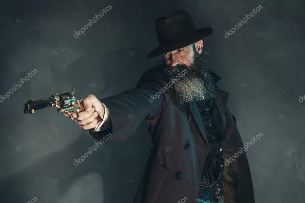 Gun shooting vintage crook Stock Photo by ©ysbrand 81901052