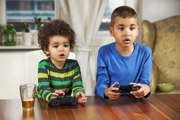 Two Boys Playing Video Game Together — Stock Photo © monkeybusiness ...