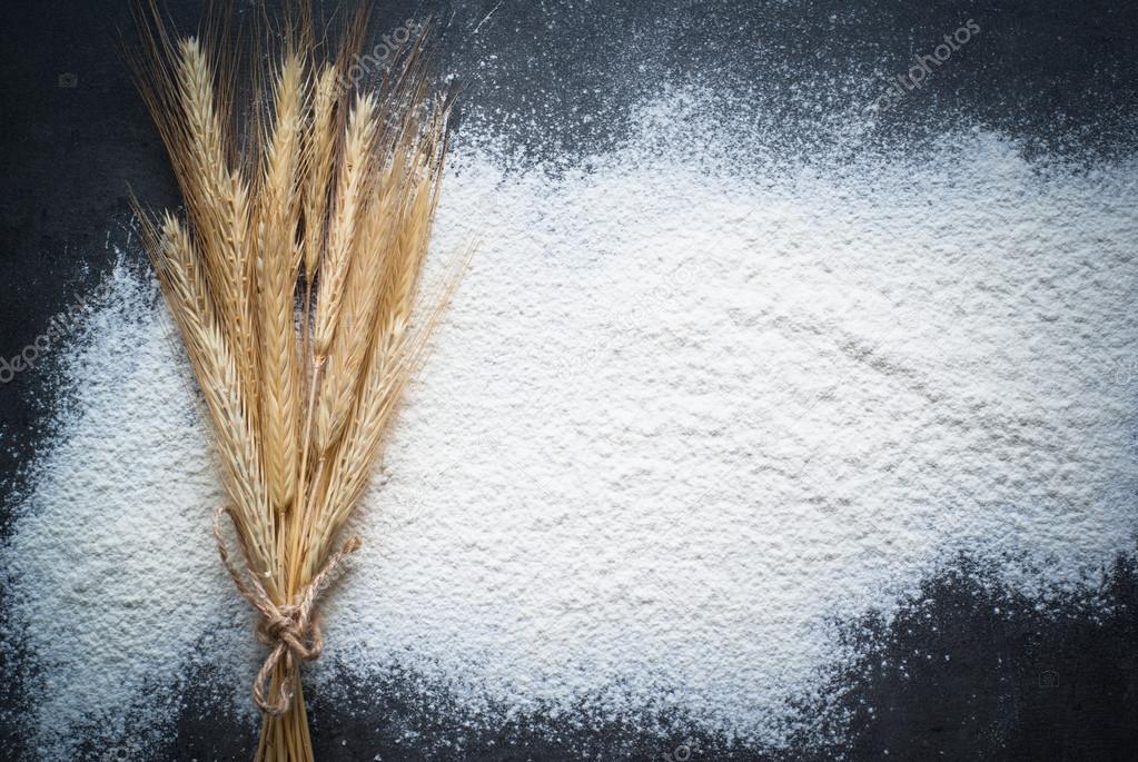 Flour background at dark Stock Photo by ©Nadianb 89209812