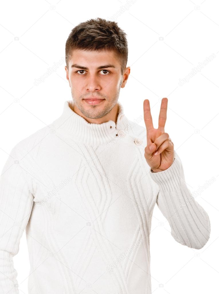 Man showing victory sign Stock Photo by ©seenaad 82421964