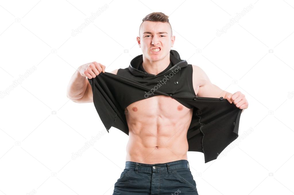 Muscular male model ripping his shirt — Stock Photo © catalin205 #67064005