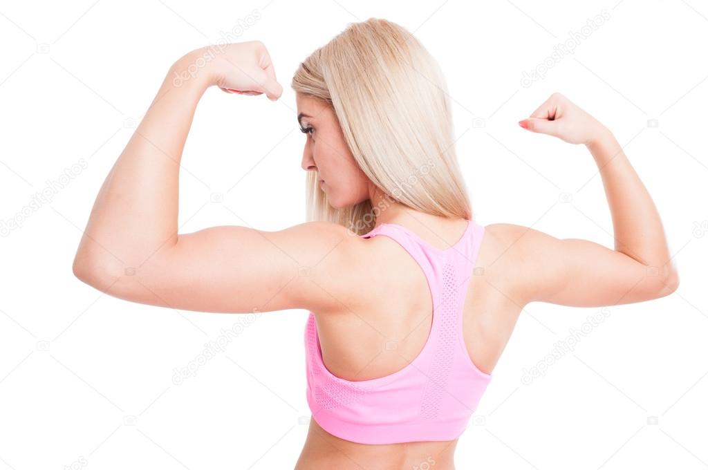 Beautiful bodybuilder girl flexing arms — Stock Photo © catalin205 ...