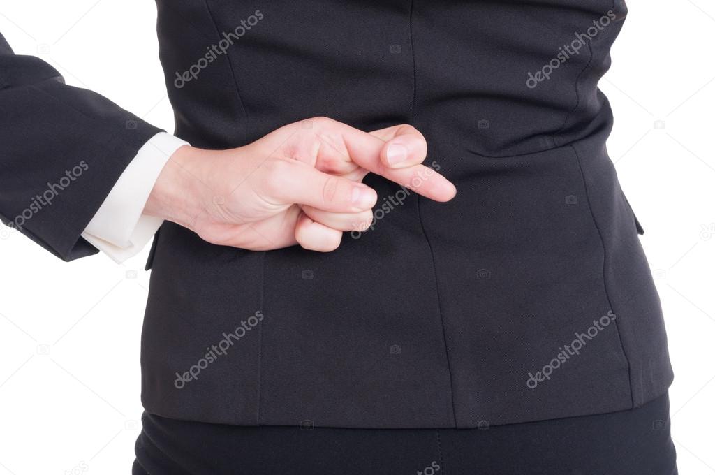 Close-up with good luck or fake promiss behind back — Stock Photo ...