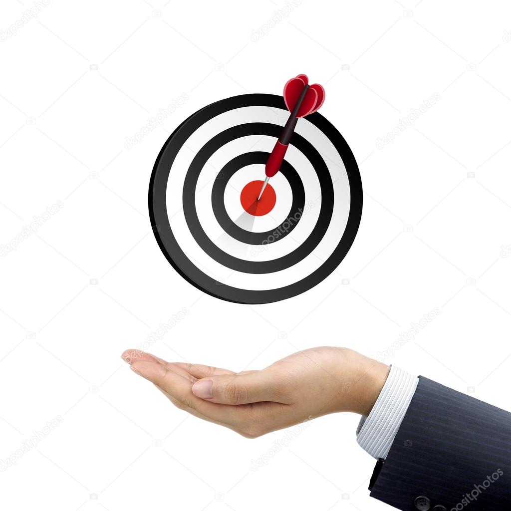 Businessman's hand holding target button Stock Photo by ©kchungtw 70351543
