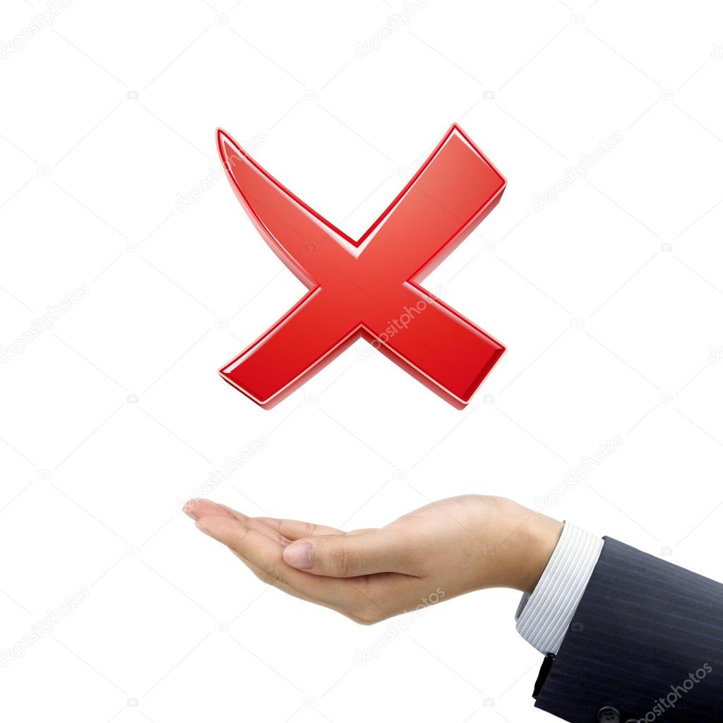 Businessman's hand holding red cross mark Stock Photo by ©kchungtw 70351611