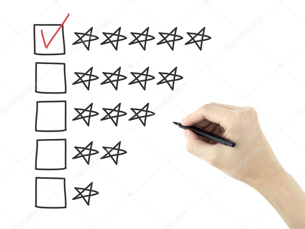 Man's hand putting check mark with pen — Stock Photo © kchungtw #71566267