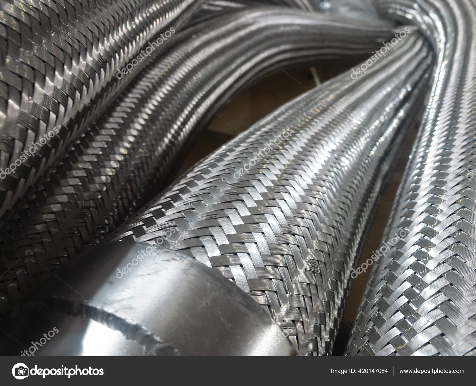Long metal flexible compensator pipes close up Stock Photo by ©Pike-28 ...