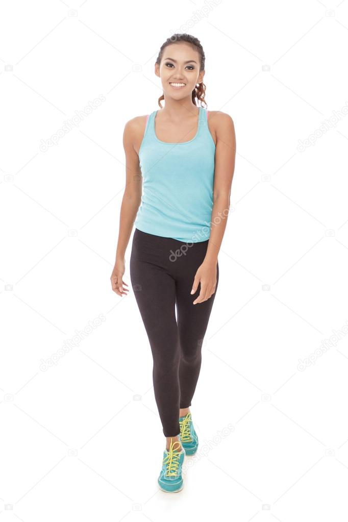 woman in walking pose while smiling — Stock Photo © odua #102303178