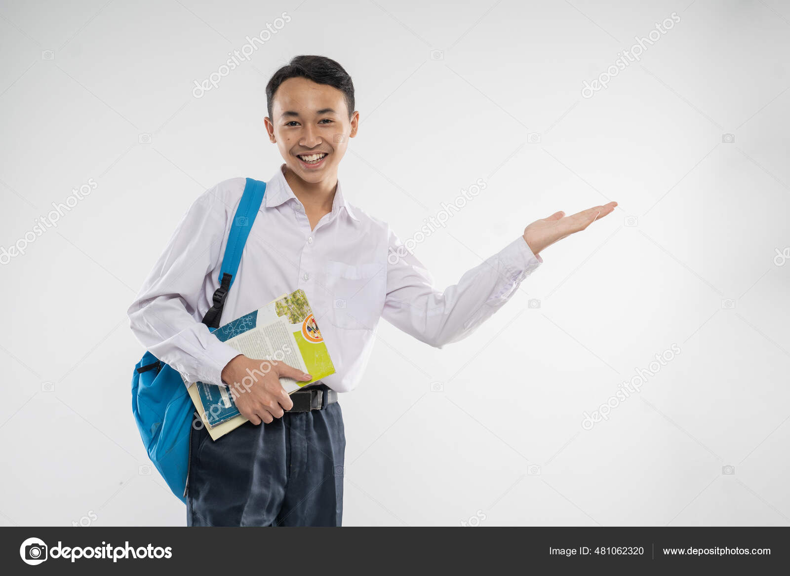 A boy in junior high school uniform offering something with a hands ...