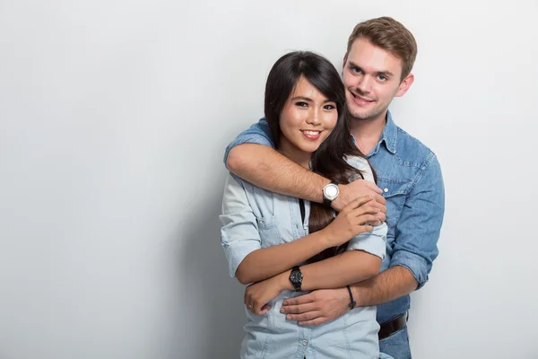 Young happy multicultural couple Stock Photo by ©odua 69176435