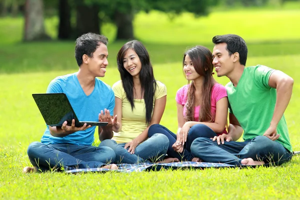 Asian student group studying in the park - Stock Image - Everypixel