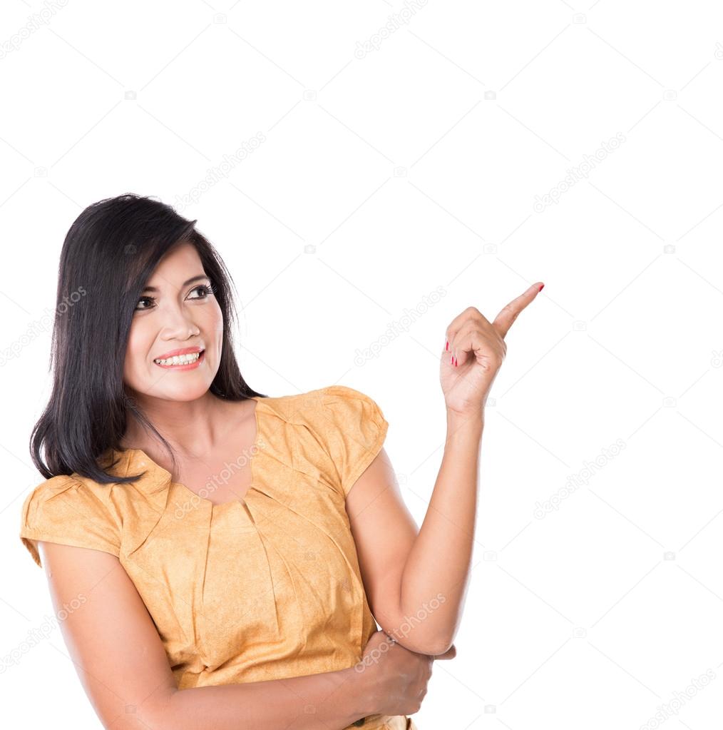 Asian woman posing pointing at something above — Stock Photo © odua ...