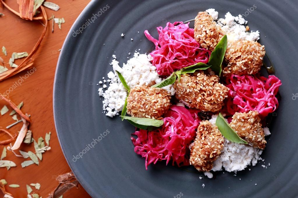 Spanish tapas crispy fried chicken served with closeslaw and ses Stock ...