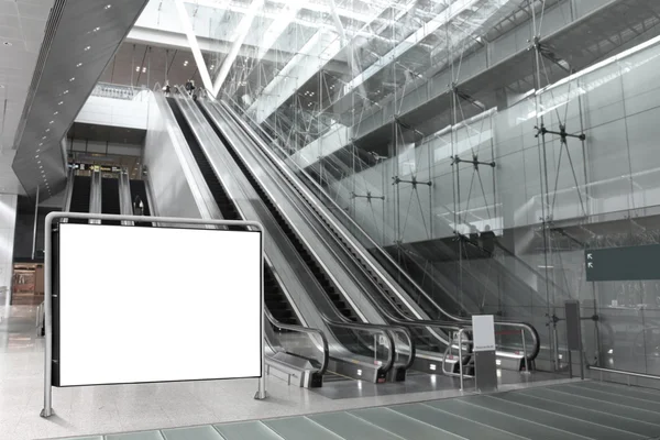 Big blank billboard screen inside a building - Stock Image - Everypixel