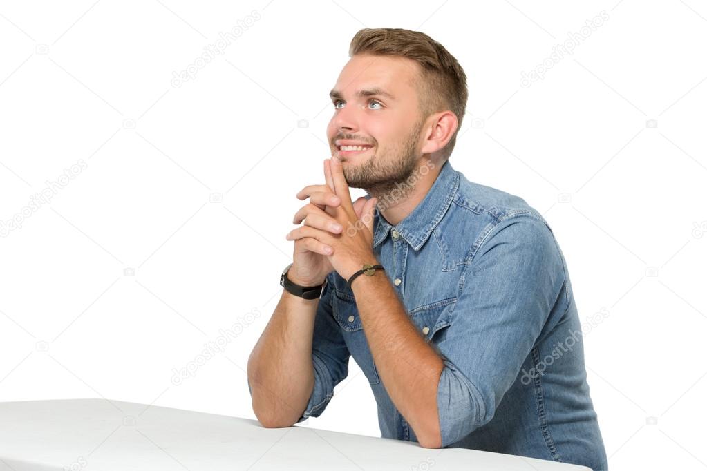Young man sitting and imagining Stock Photo by ©odua 84330054