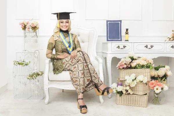 Indonesia female graduated student wearing traditional clothes — Stock ...
