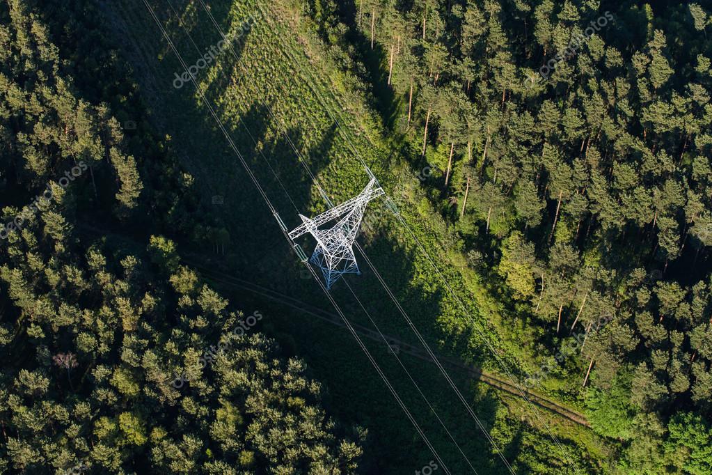 Aerial view of electrical wires in fields Stock Photo by ©yeti88 90292822