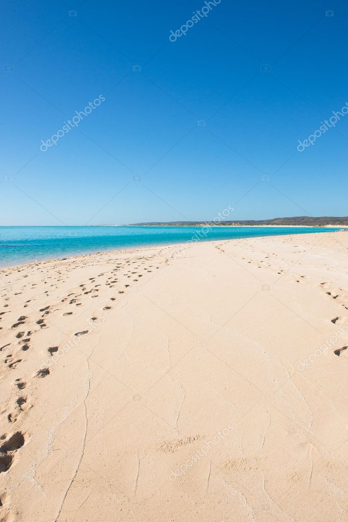 Footprints remote tropical paradise beach — Stock Photo © roboriginal ...