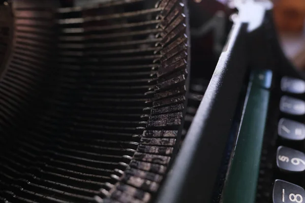 old typewriter on table, words fake news are printed on paper in large ...