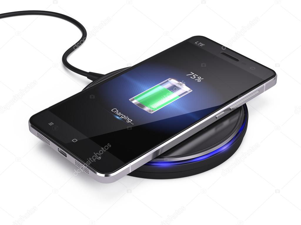 Wireless charging of smartphone Stock Photo by ©Sashkin7 100555558