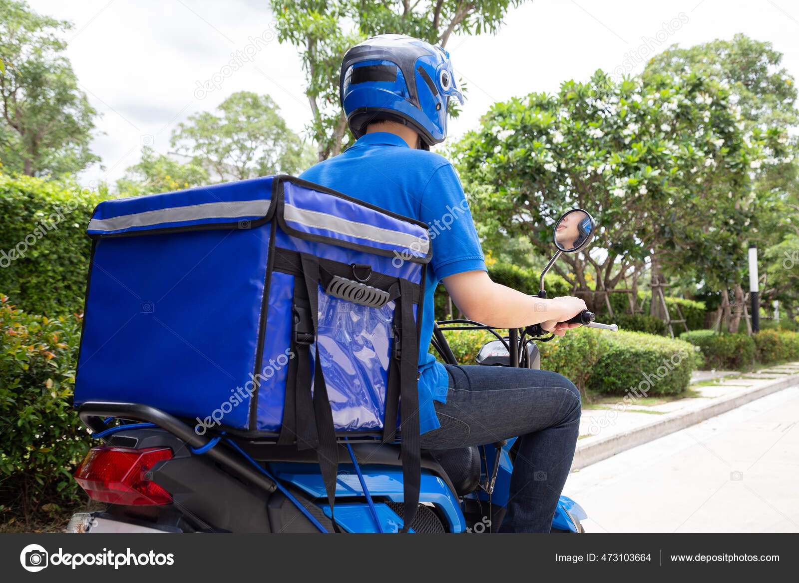 Delivery Man Wearing Blue Uniform Riding Motorcycle Delivery Box ...