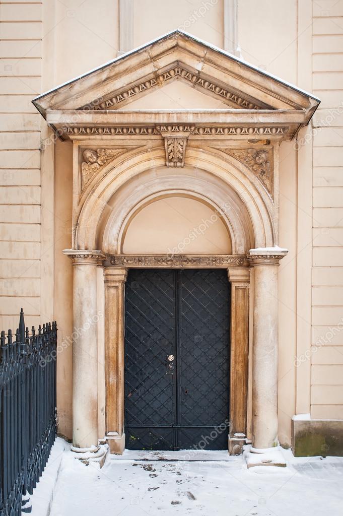 Doors with architectural columns Stock Photo by ©timonko 62198877