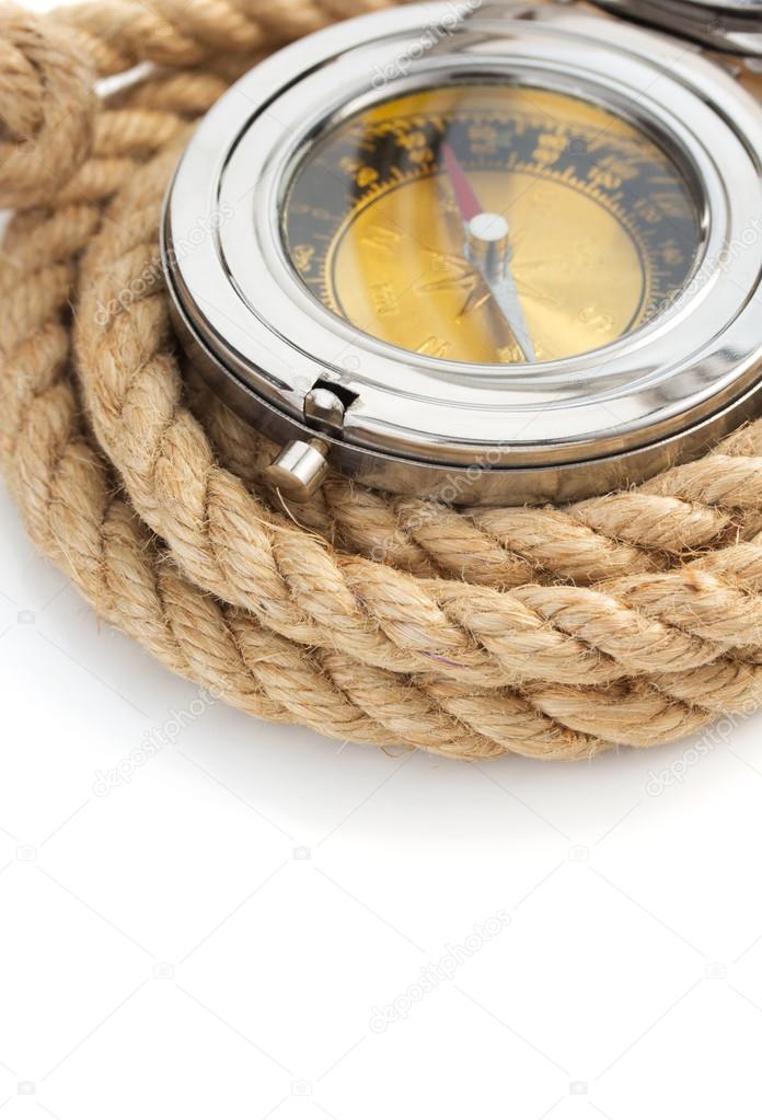 Ship rope and compass Stock Photo by ©seregam 83471688