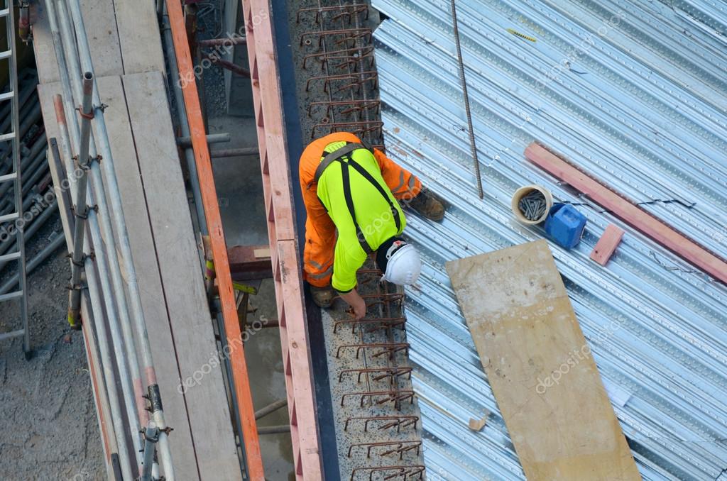 Construction worker making reinforcement in building site Stock Photo ...