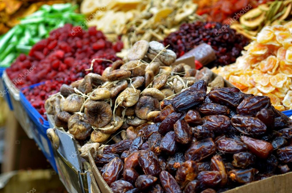 Dried fruits on display in food marke — Stock Photo © lucidwaters #74788353