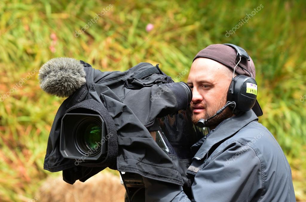 Camera operator shooting on location event – Stock Editorial Photo ...