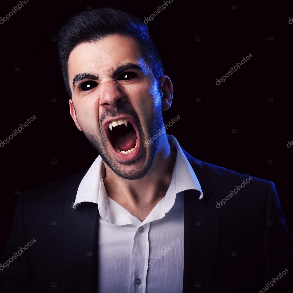 Scary man with black eyes and fangs — Stock Photo © jaycriss #59818199