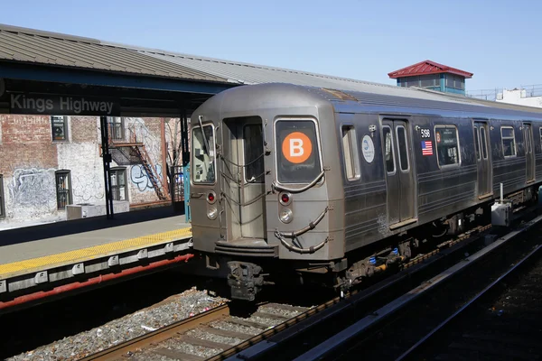 NYC Subway Q Train arriving at Kings Highway Station in Brooklyn ...