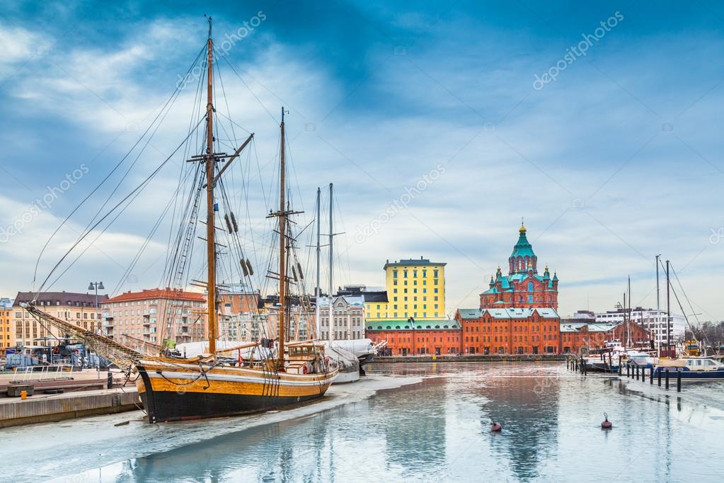 Helsinki harbor district with Uspenski cathedral in winter, Finland ...