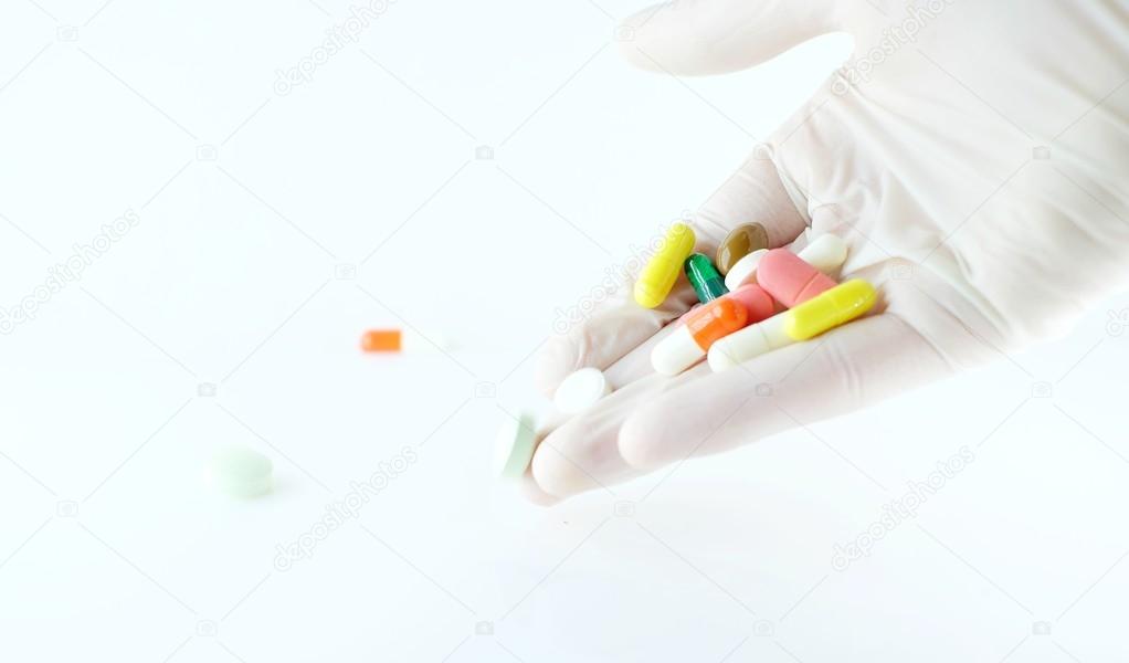 A variety of tablets in the hands — Stock Photo © Qzian #100326022