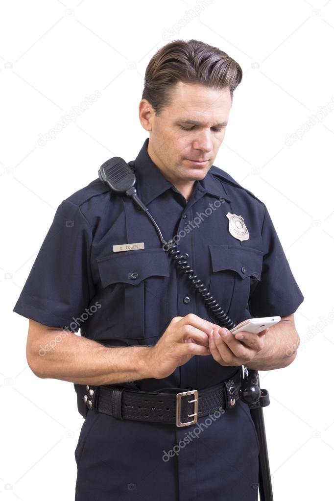 Police officer using cell phone Stock Photo by ©czuber 93358934