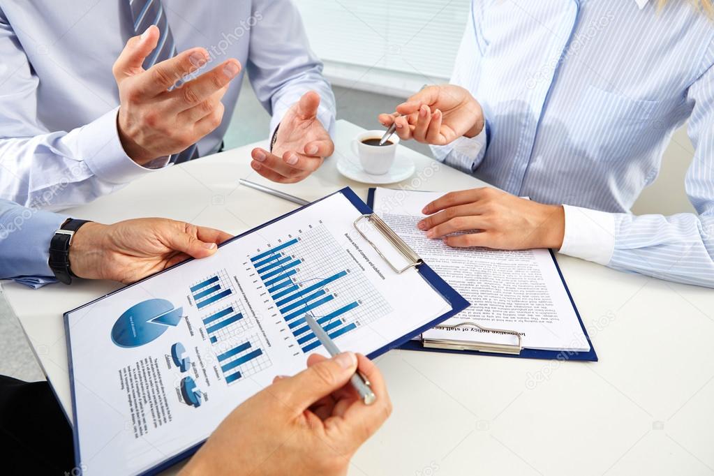 Discussion of business documents — Stock Photo © pressmaster #101008366