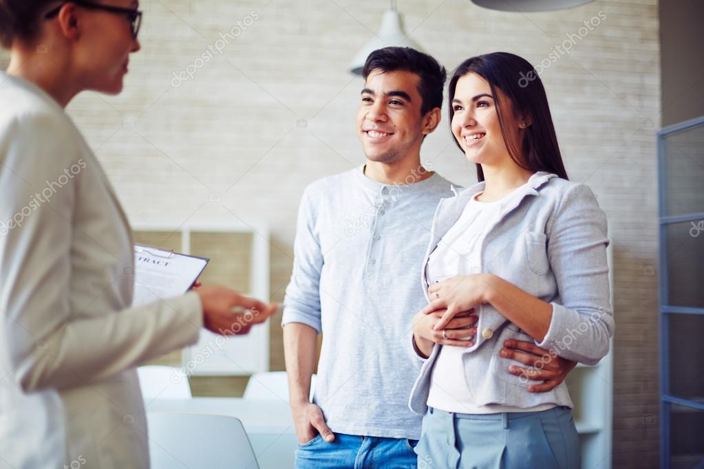 Agent handing over keys Stock Photo by ©pressmaster 122110892