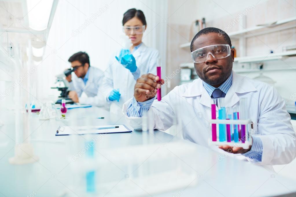 Scientist Posing in Laboratory — Stock Photo © pressmaster #122112522