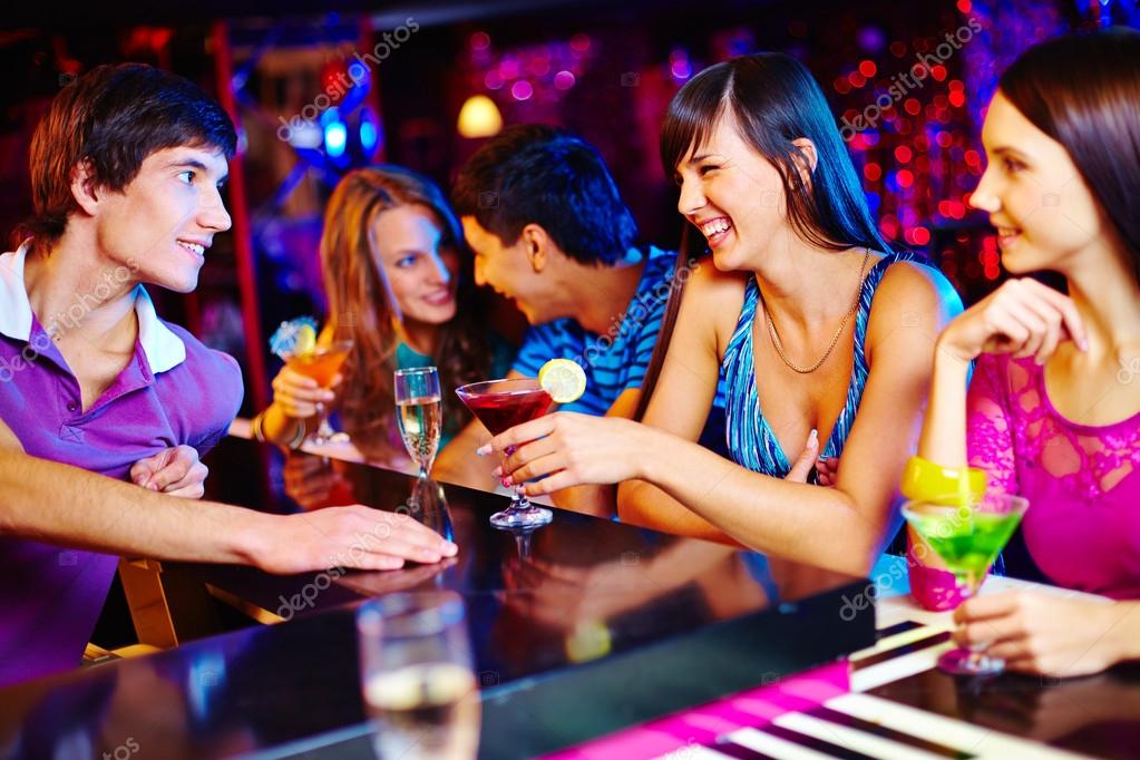 Friends talking at party — Stock Photo © pressmaster #55474889