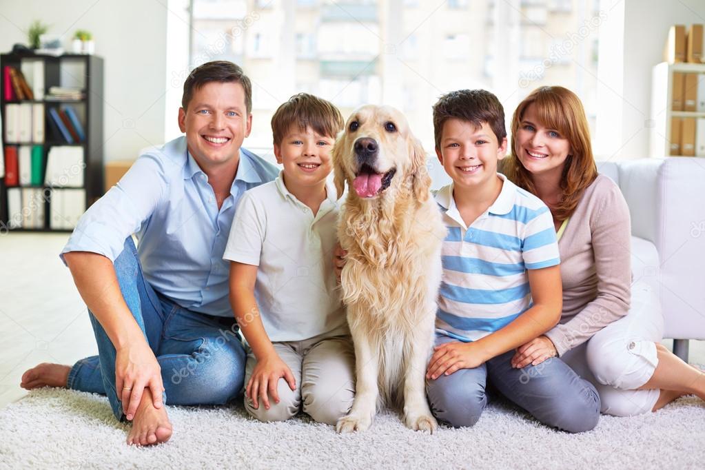 Family with Labrador dog — Stock Photo © pressmaster #62857789