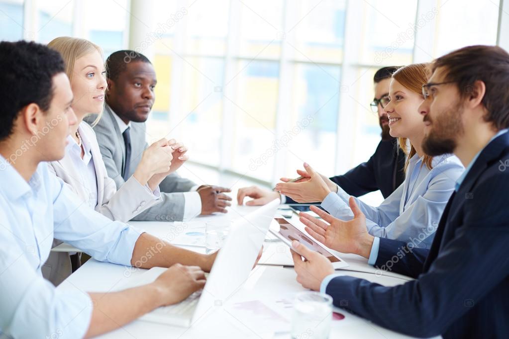 Business people communicating Stock Photo by ©pressmaster 69404723 Business people communicating Stock Photo by ©pressmaster 69404723